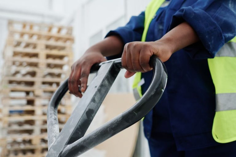 How Does a Hand Pallet Truck Complement Forklift Trucks in Material ...